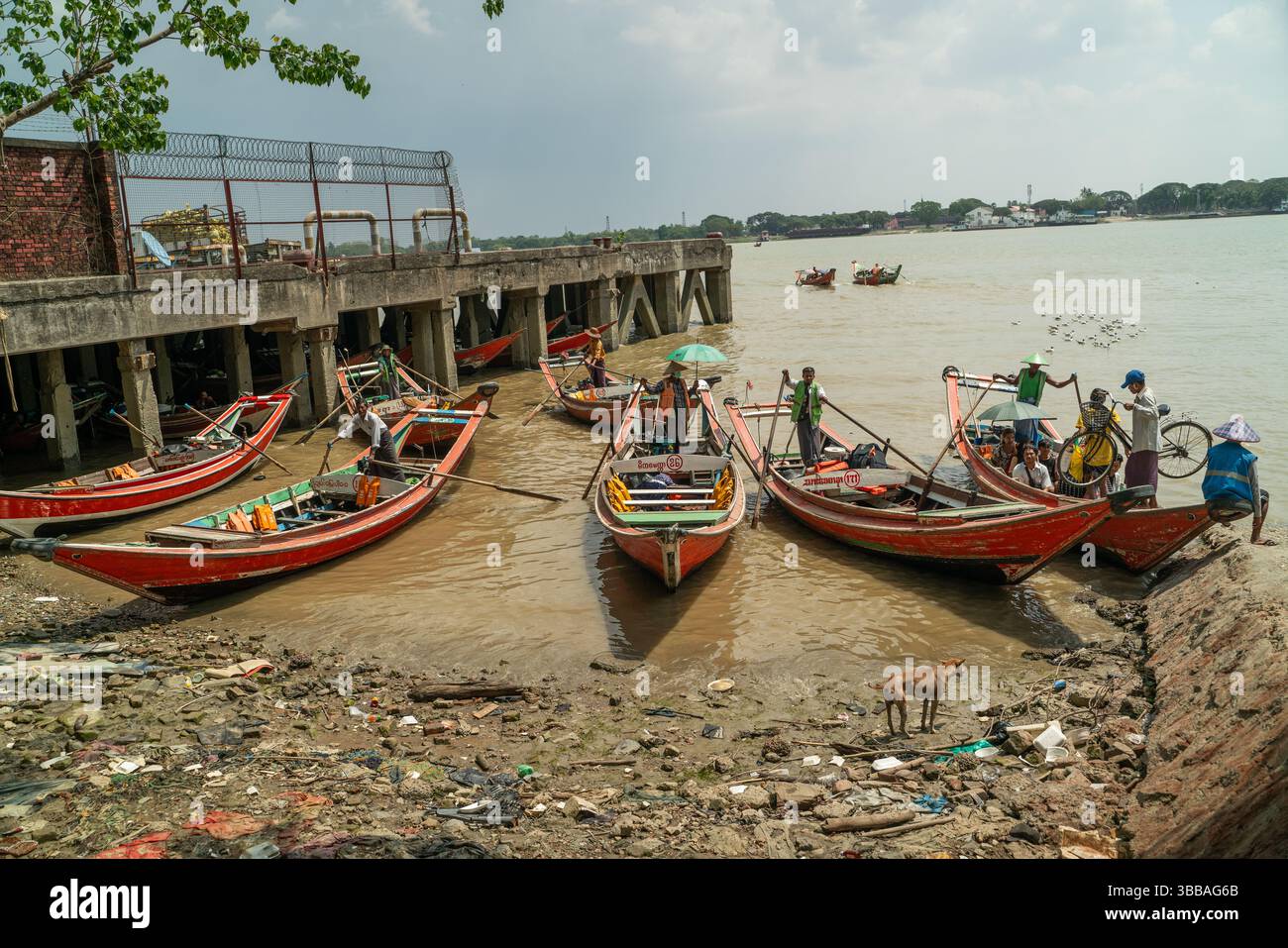 Yangon, Myanmar - 6 April, 2025: Various large and small boats are ...