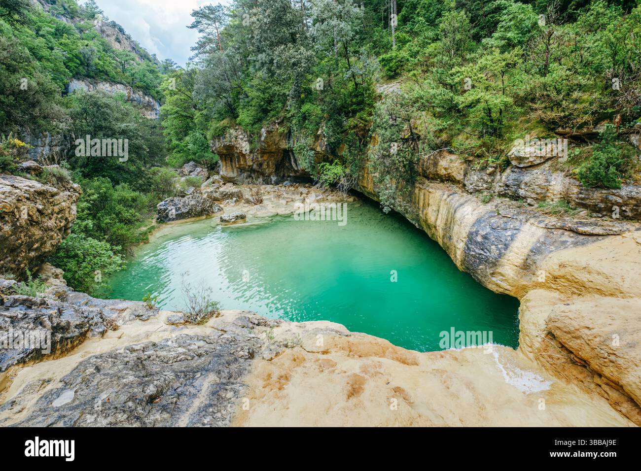 Pristine natural rock pools with crystal clear water. River-carved ...