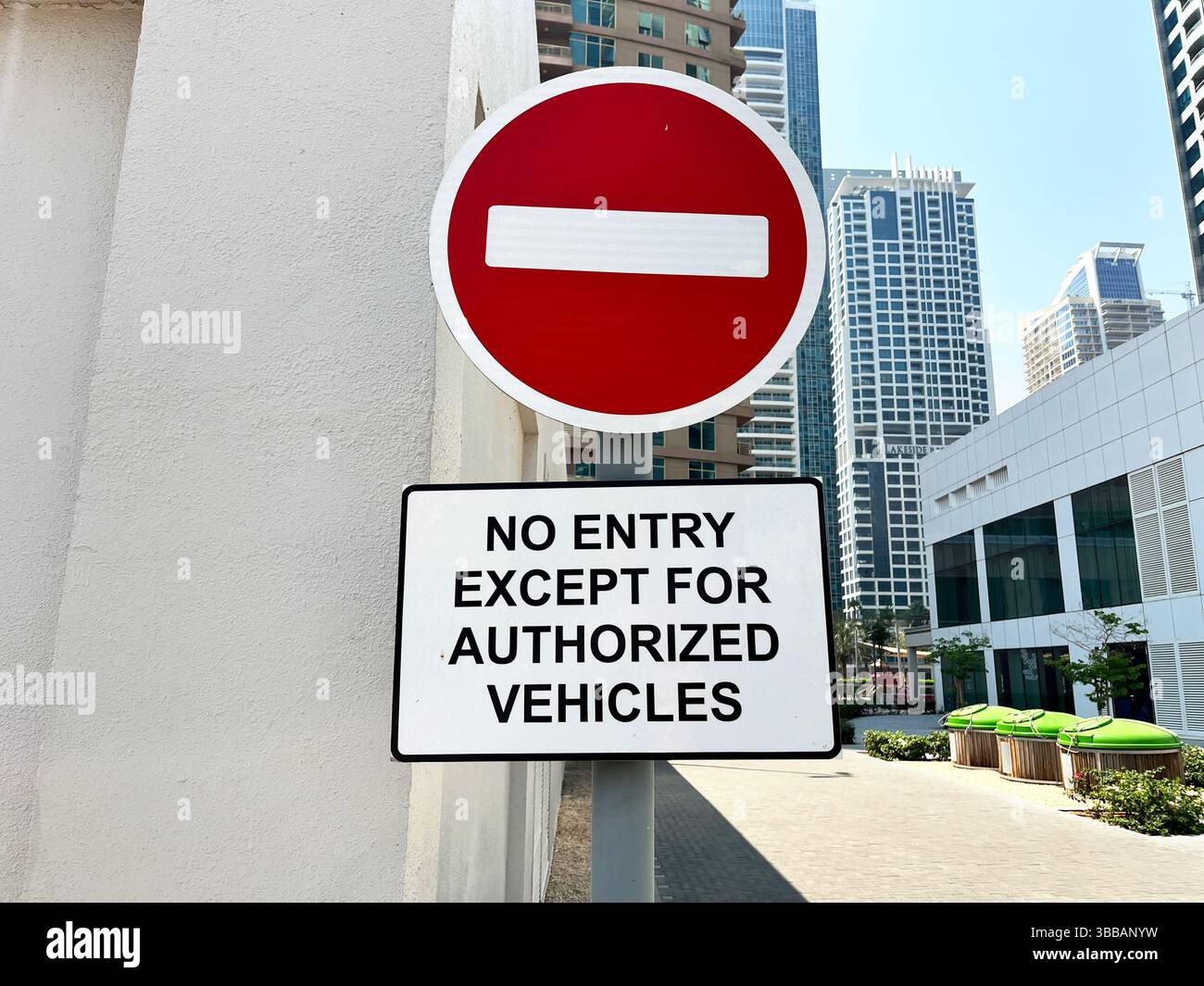 No Entry Sign with Authorized Vehicles Exception in Modern Urban ...