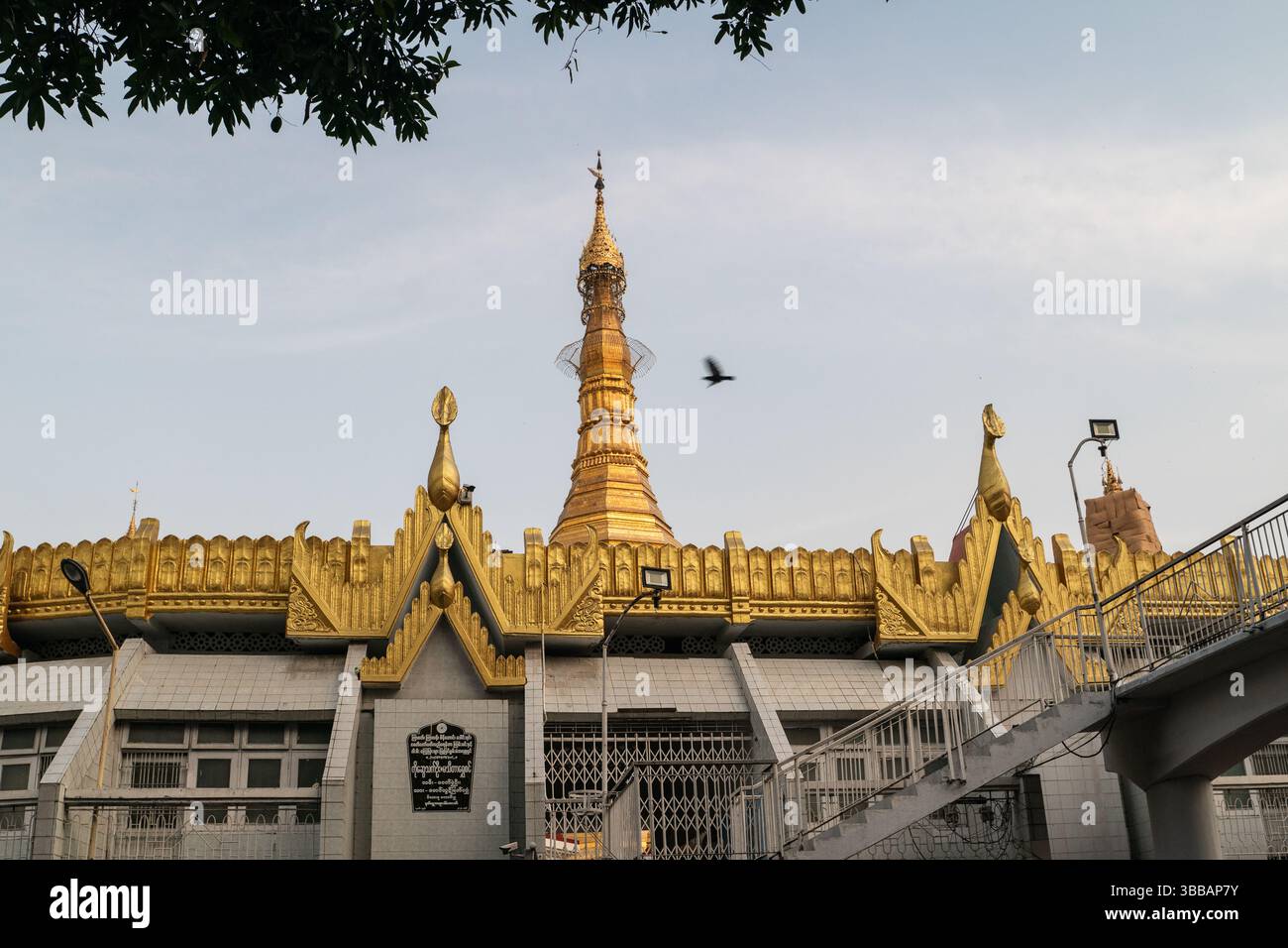 Yangon, Myanmar - 6 April, 2025: A view of the iconic Sule Pagoda, a historic Buddhist stupa ...
