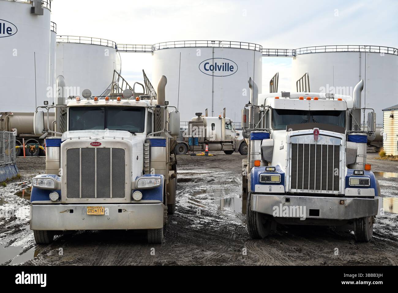 Trucks seen before oil tanks in Deadhorse, Alaska, USA Stock Photo - Alamy