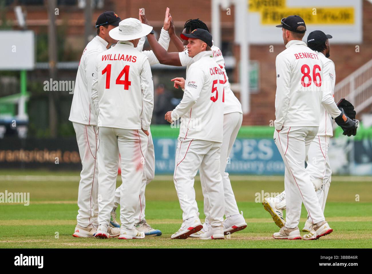 Leicester, UK. 15th May, 2025. Zimbabwe players celebrate taking the ...