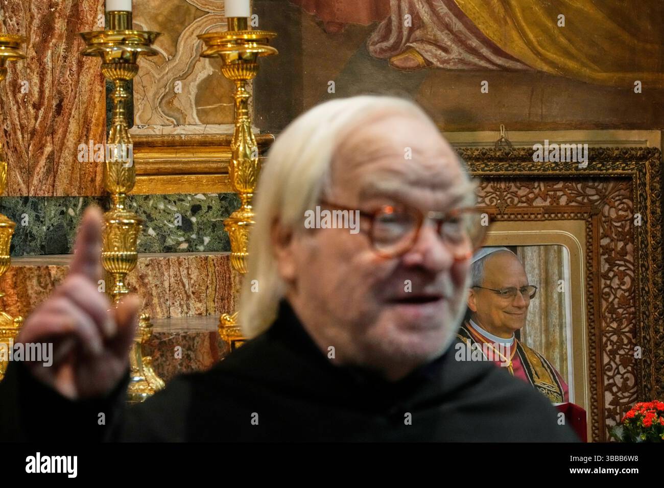 With a picture of Pope Leo XIV in the background, Augustinian friar ...