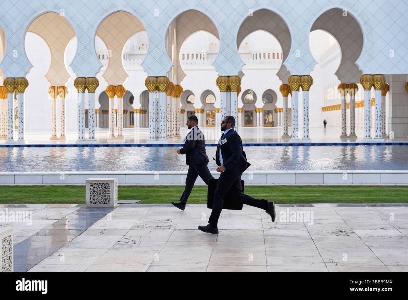 Secret Service men run during a tour by President Donald Trump and UAE ...