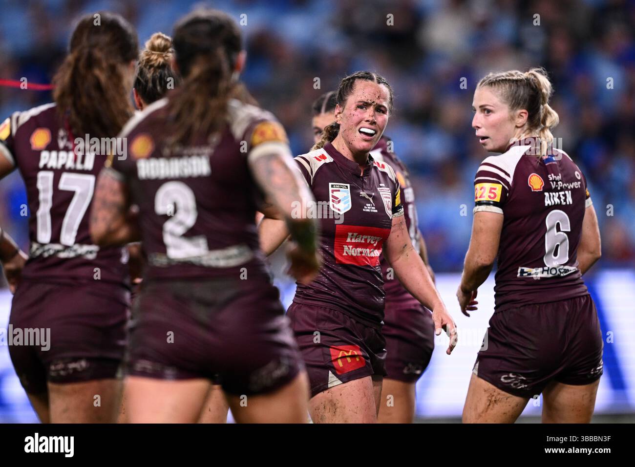 Keilee Joseph of the Maroons (centre) reacts during the Women's State ...