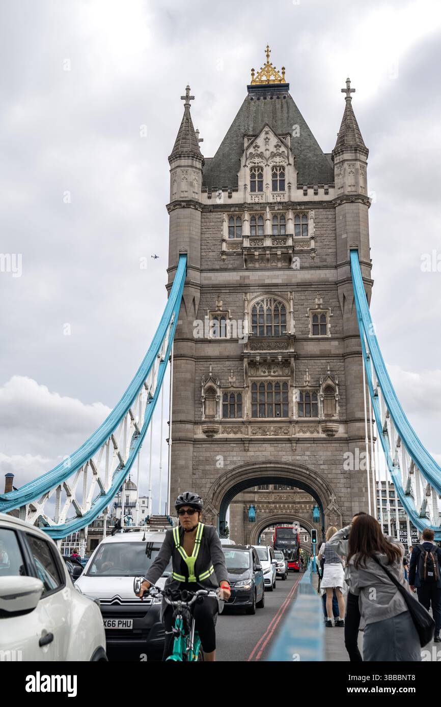 London, England, 11 July 2023, Pedestrians and Vehicles Cross Tower ...