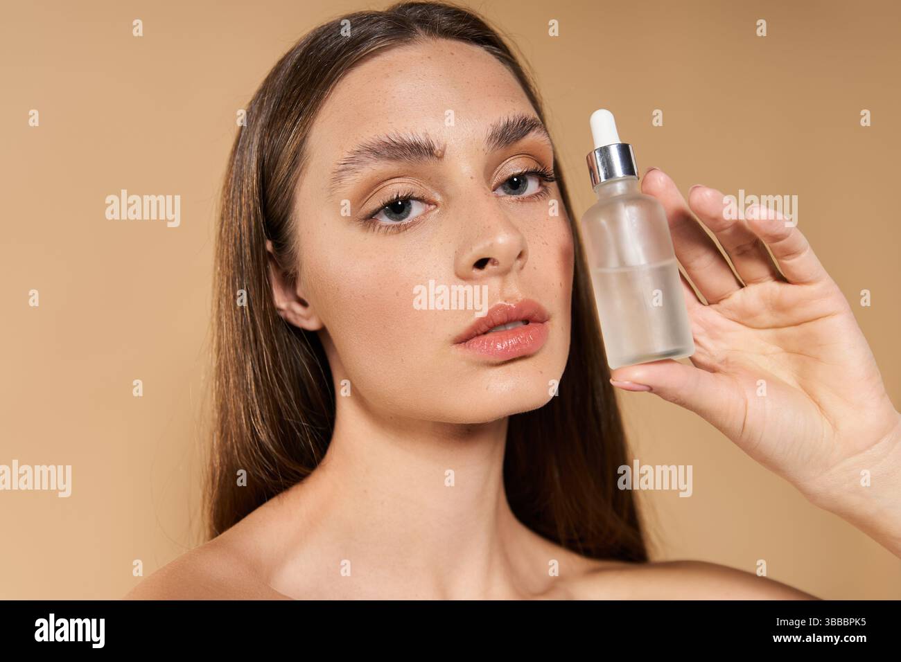 Young woman highlights the elegance of summer with a glowing complexion ...