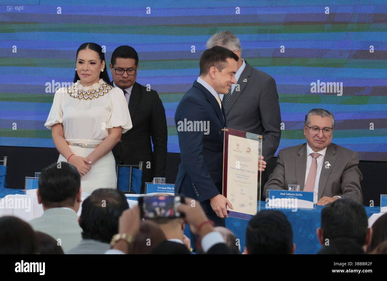 DELIVERY OF CREDENTIALS May 15, 2025 Diana Atamaint President of the CNE delivers credentials as ...