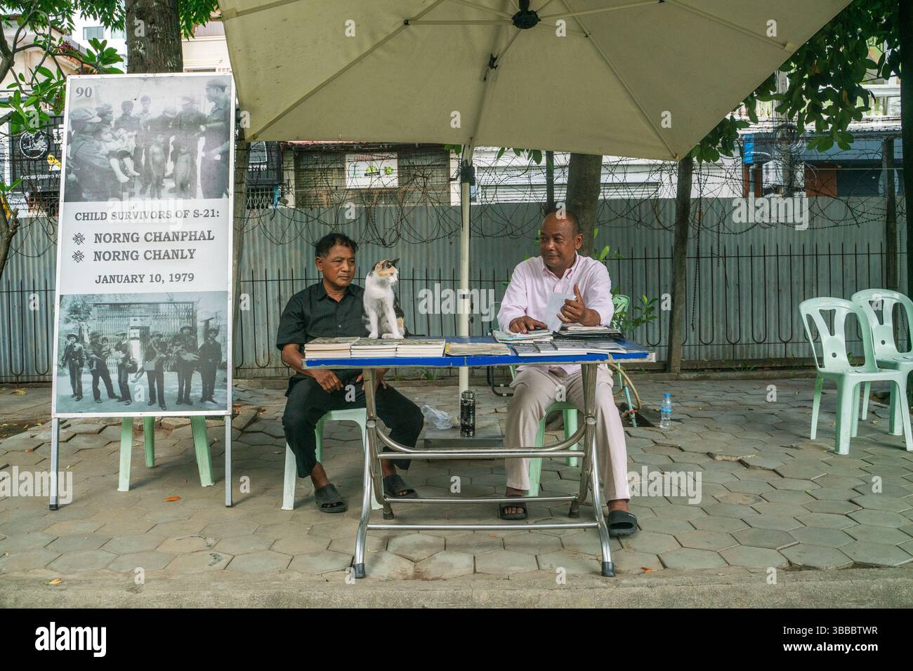 Phnom Penh, Cambodia – 16 April, 2025: A photograph of Norng Chan Phal and his little brother ...