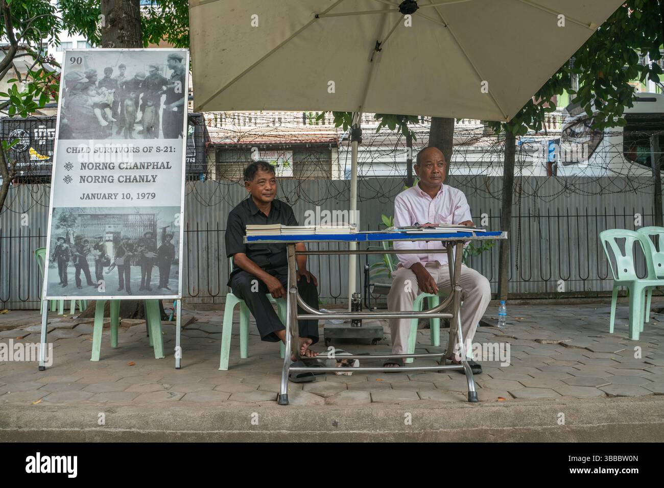 Phnom Penh, Cambodia – 16 April, 2025: A photograph of Norng Chan Phal and his little brother ...