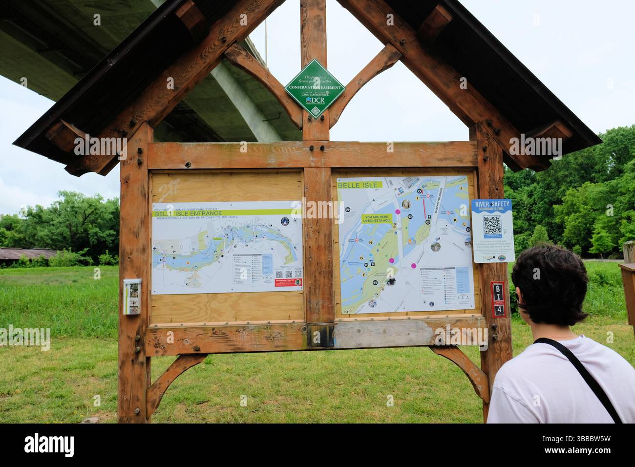 Park Visitor at Belle Isle reading mounted map; part of the James River ...