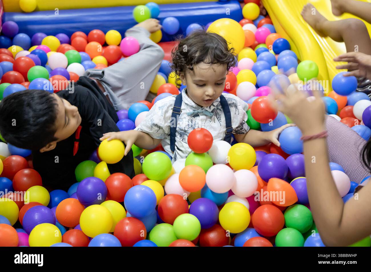 Indian family happy 2 kids indoor hi-res stock photography and images ...