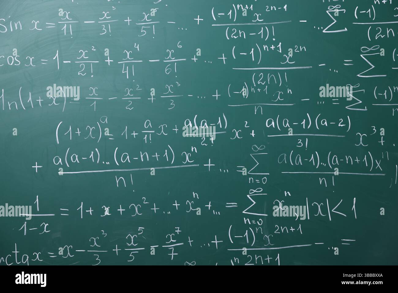Different formulas written with chalk on blackboard Stock Photo - Alamy