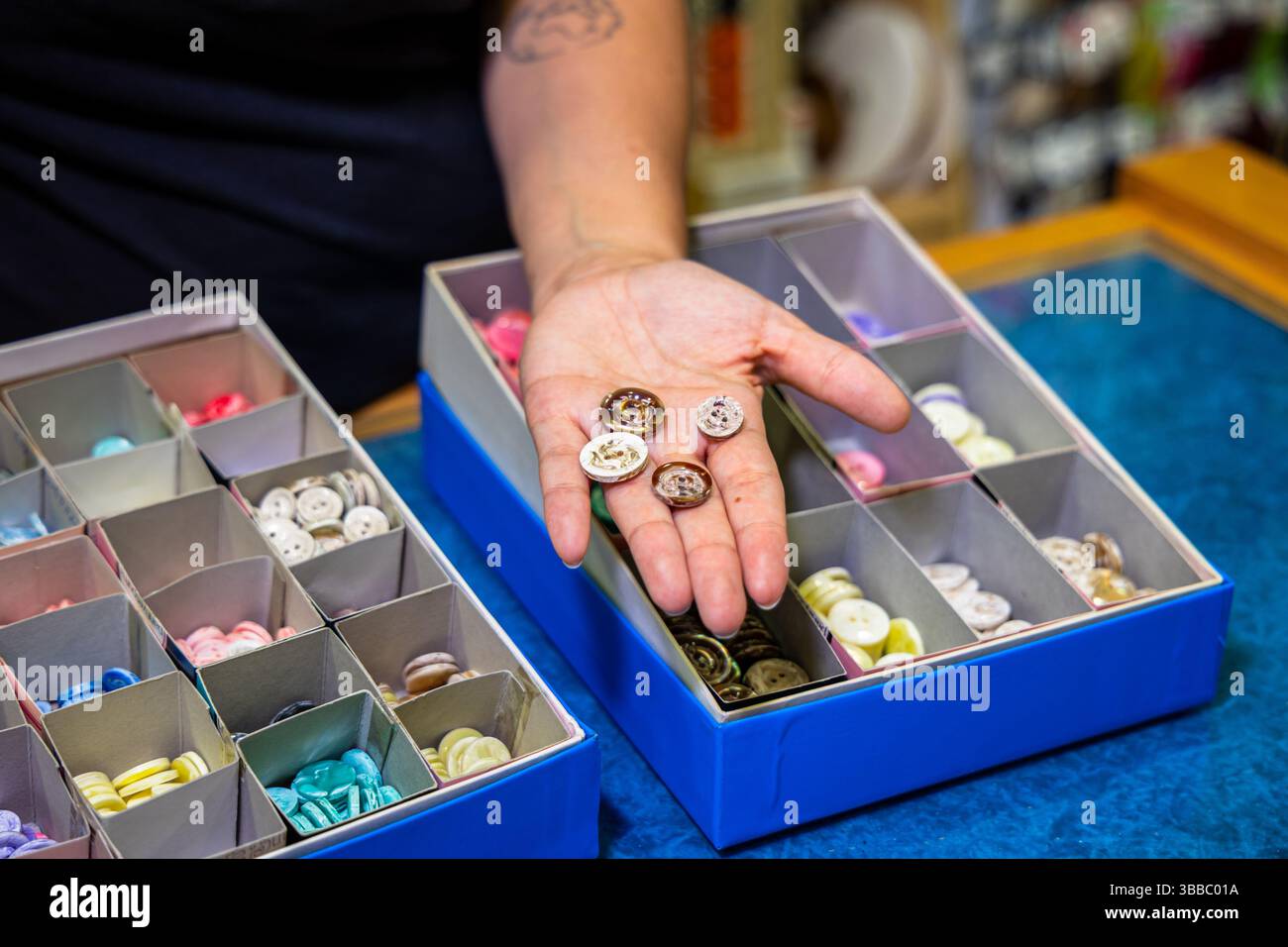Person holding multiple colorful hi-res stock photography and images ...