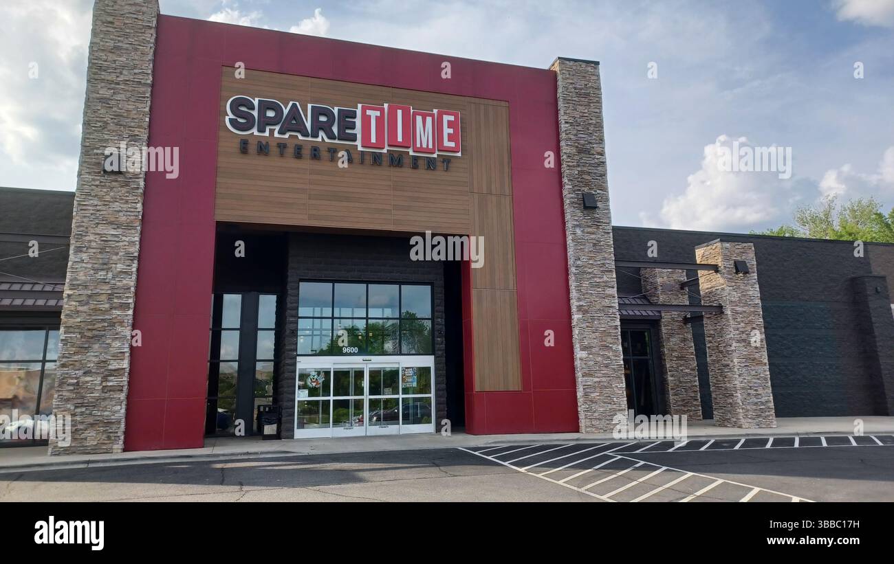 Charlotte, NC, USA, April 30, 2025: Multiple bowling lanes with scoring ...