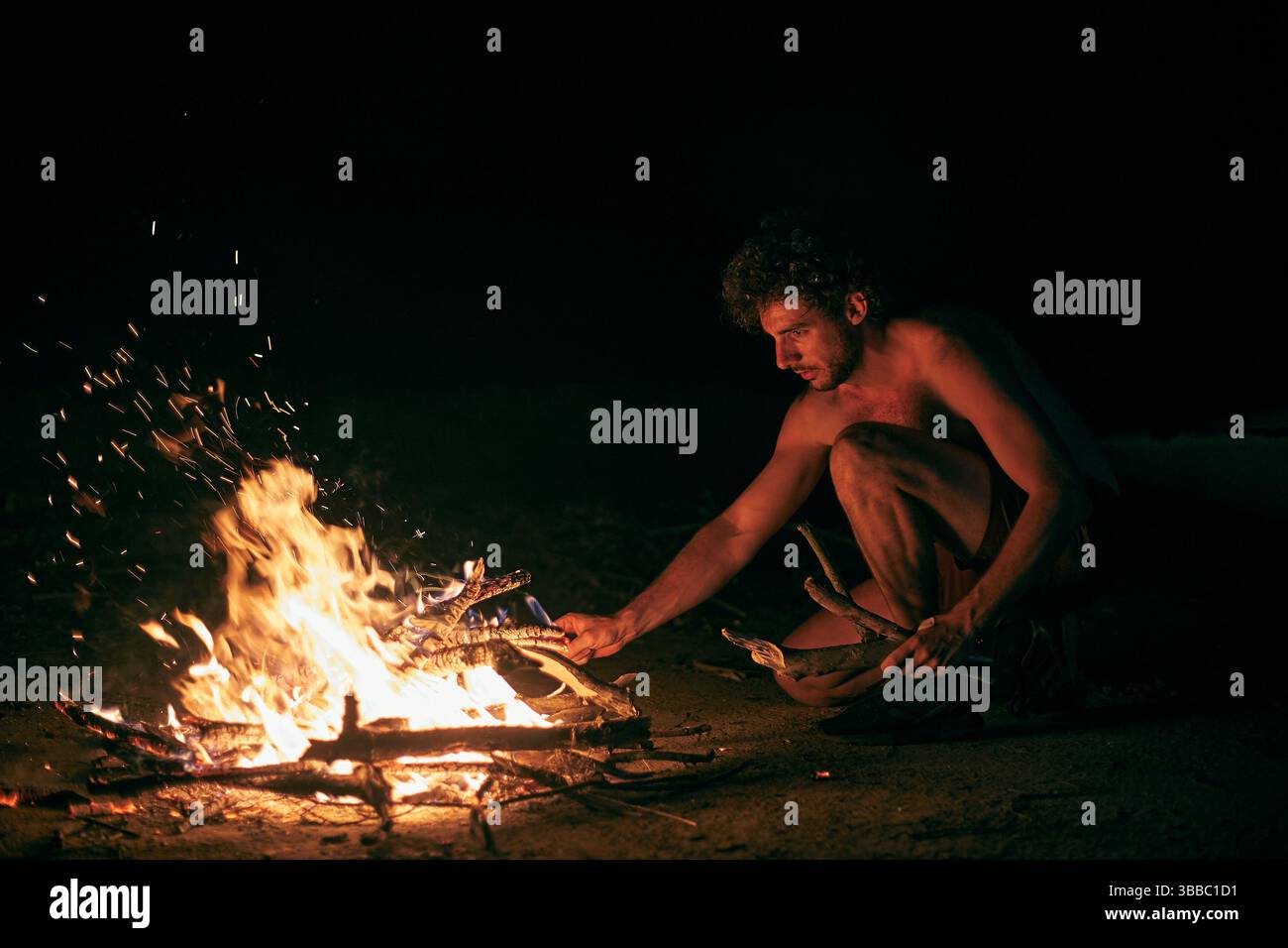 Traveler warming campfire hi-res stock photography and images - Alamy