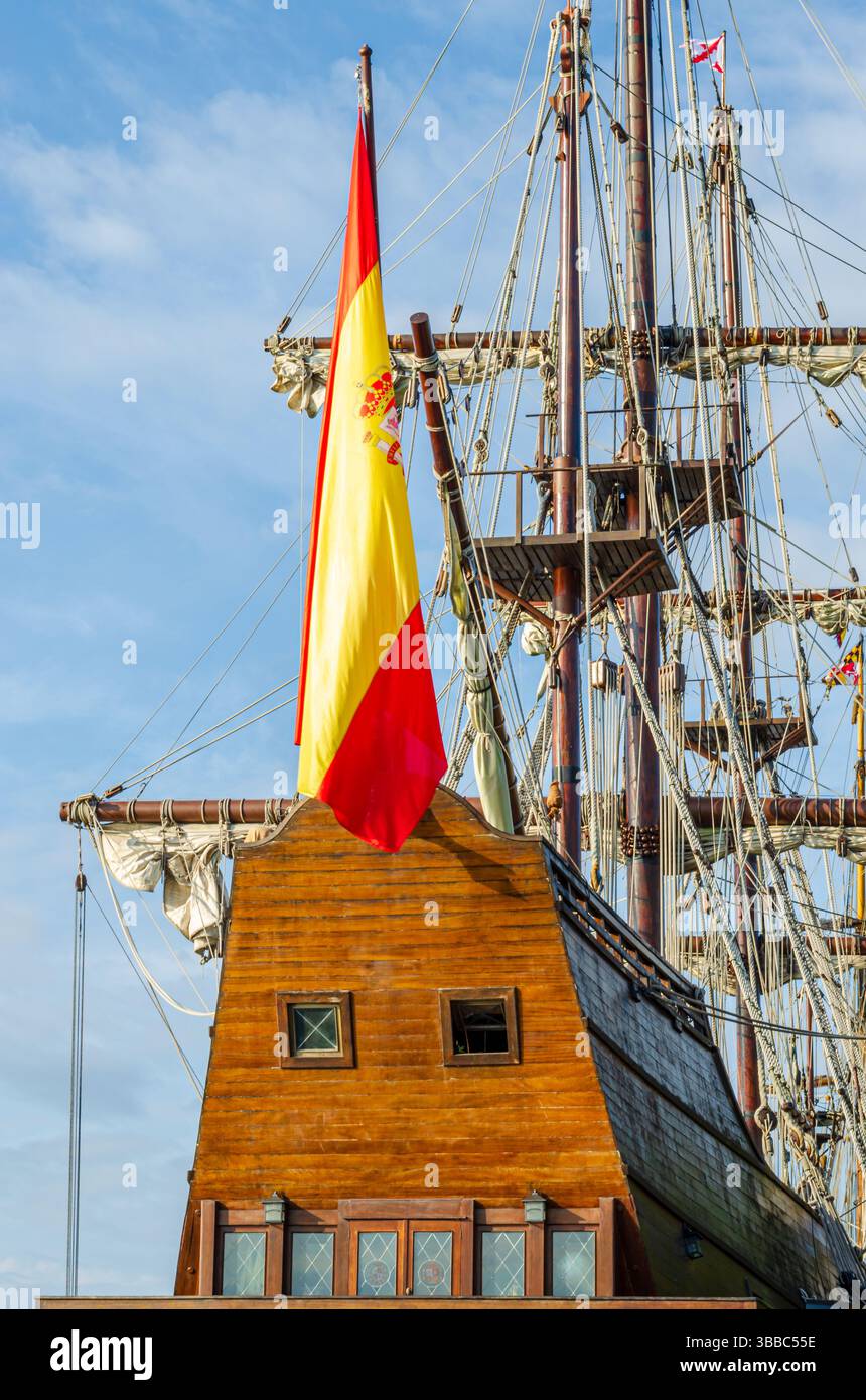 Replica galleon at dock with furled sails under a cloudy sky on the St ...