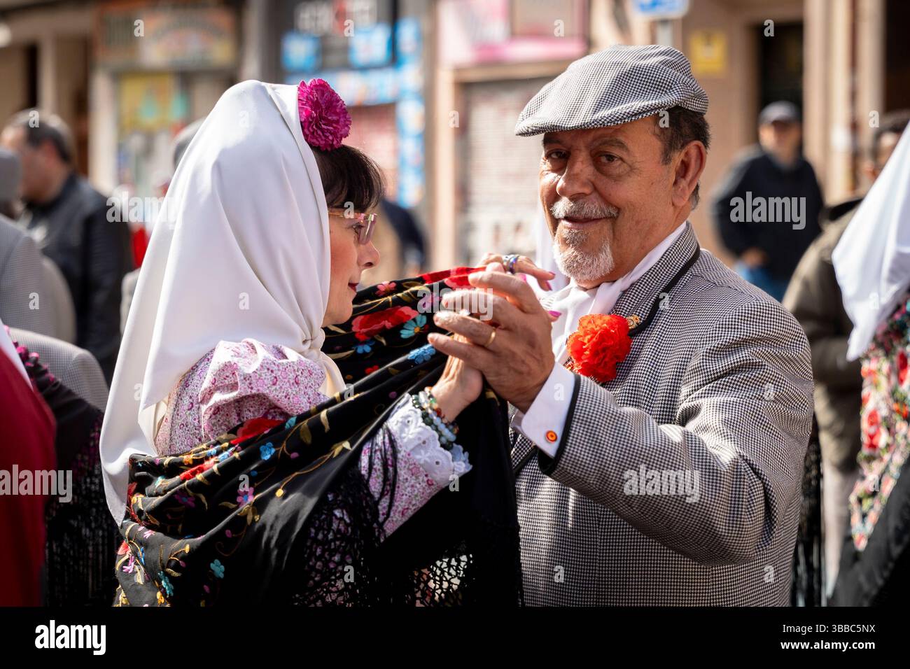 People wearing the traditional Madrid costumes known as ‘chulapo’ and ...