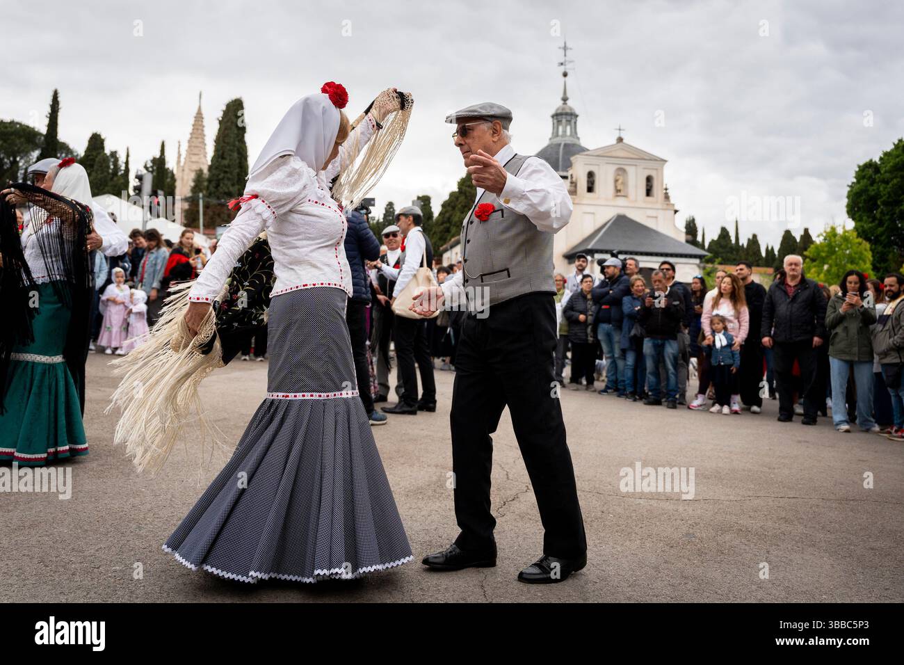 People wearing the traditional Madrid costumes known as ‘chulapo’ and ...
