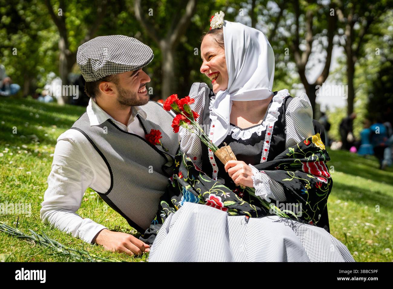 People wearing the traditional Madrid costumes known as ‘chulapo’ and ...