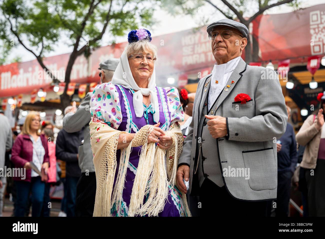 People wearing the traditional Madrid costumes known as ‘chulapo’ and ...