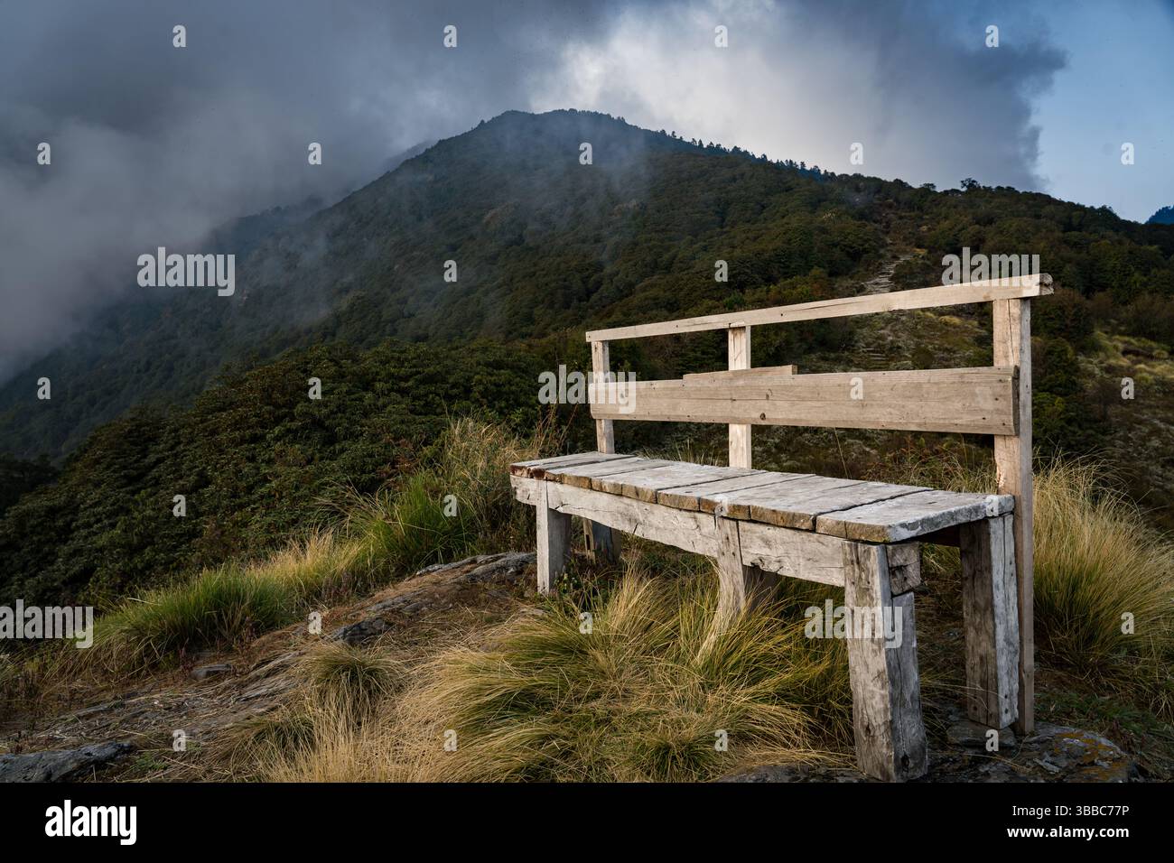 Wooden Bench on a Mountain Vista with Cloudy Sky for Evening View of ...