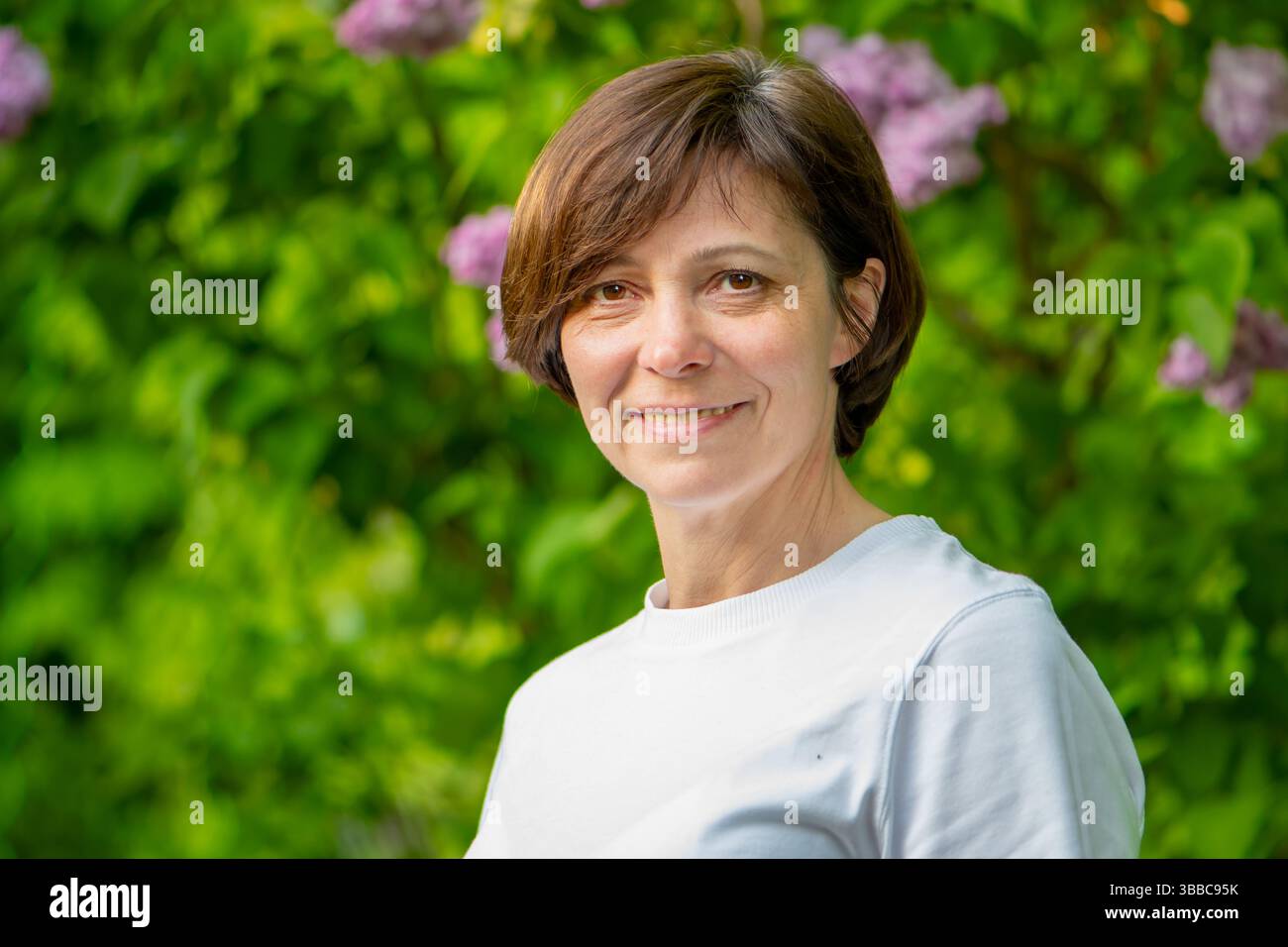 Womans warm smile hi-res stock photography and images - Alamy
