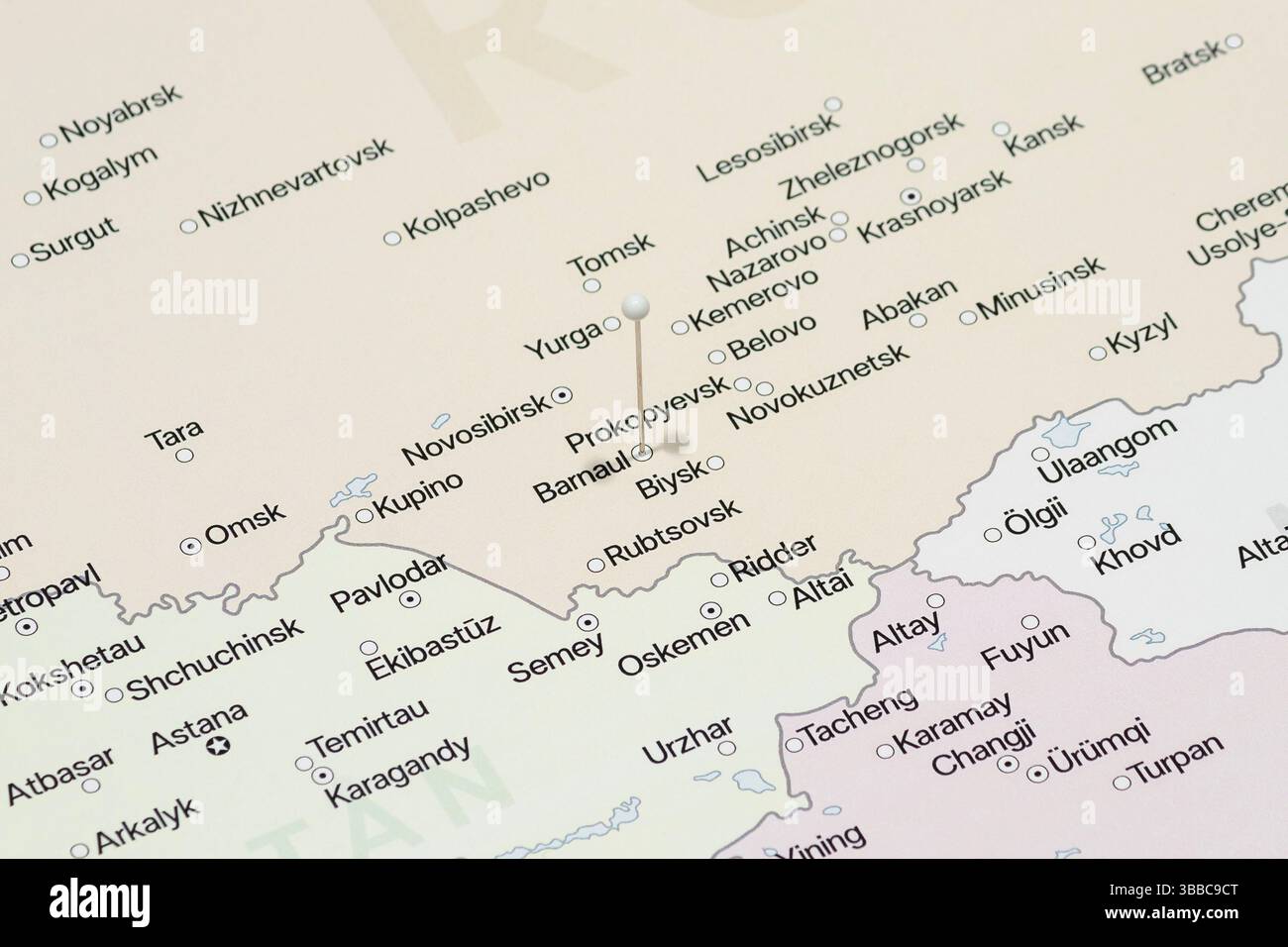 macro photo of a white pin needle into Barnaul city of Russia political ...