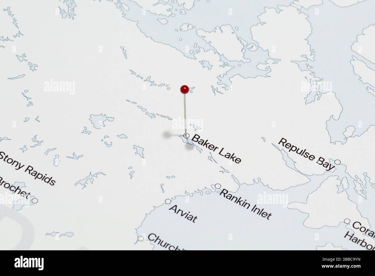 macro photo of a red pin needle into baker lake city of Canada ...