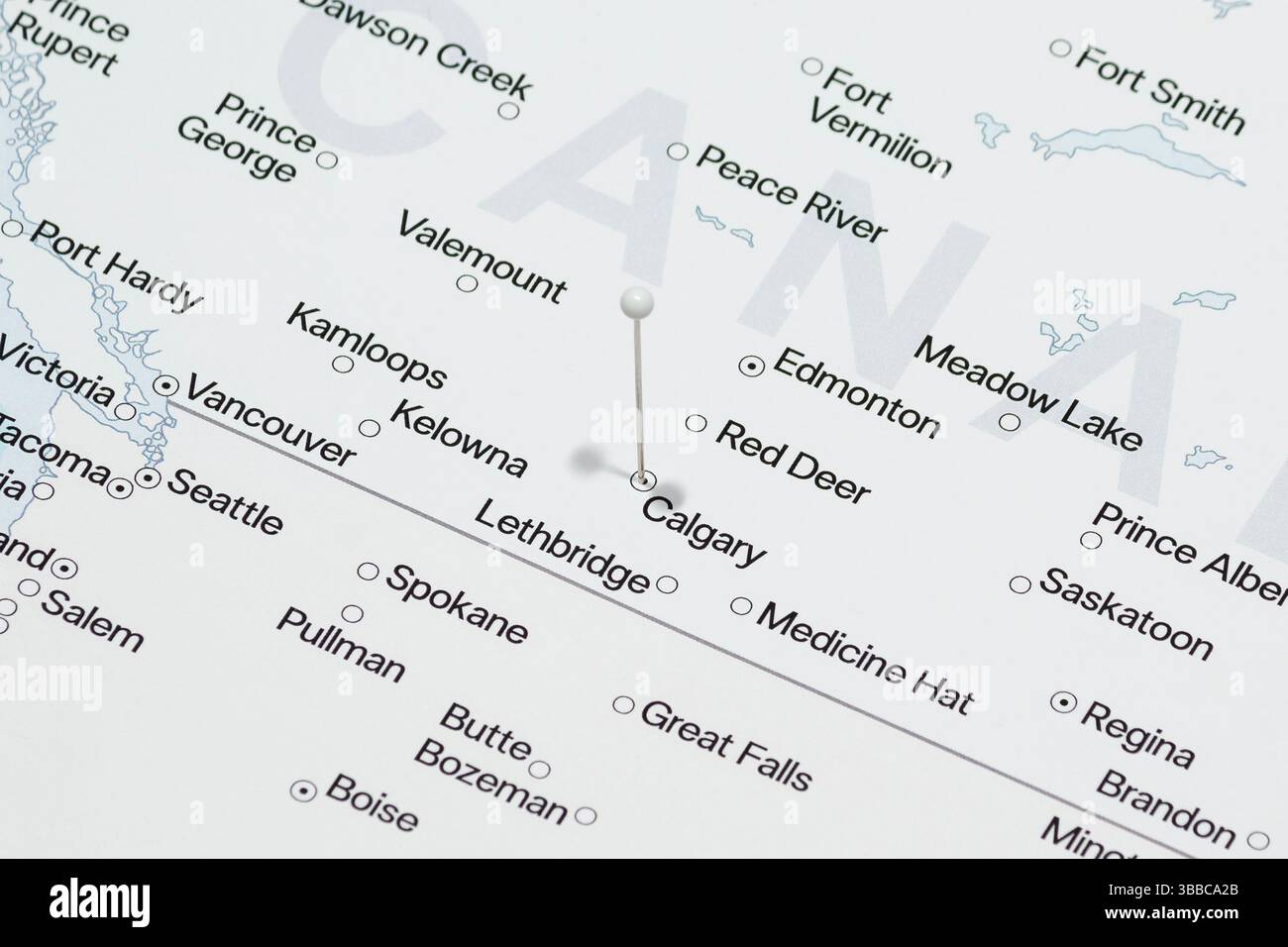 macro photo of a white pin needle into calgary city of Canada political ...