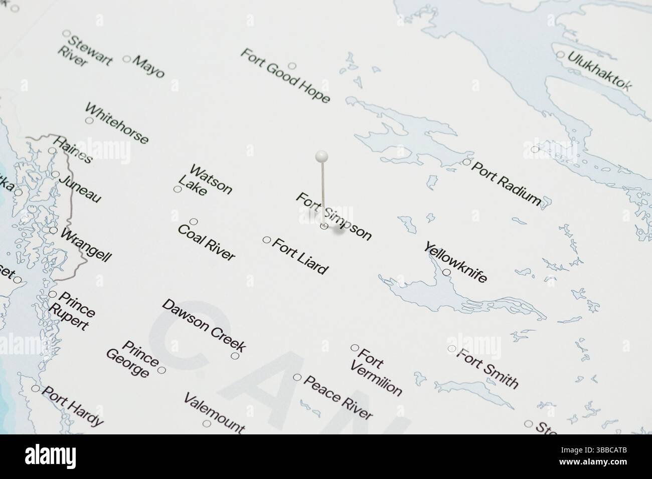 macro photo of a white pin needle into fort simpson city of Canada ...