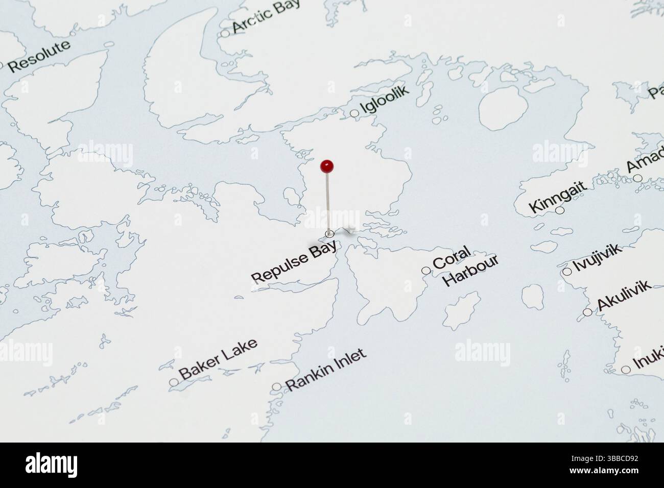 macro photo of a red pin needle into repulse bay city of Canada ...