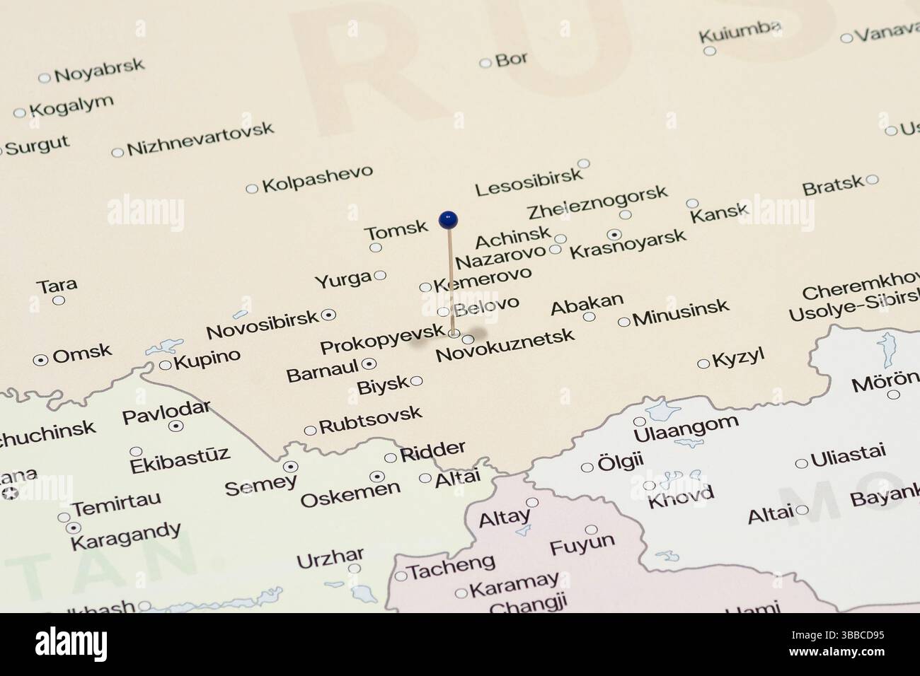 macro photo of a blue pin needle into prokopyevsk city of Russia ...