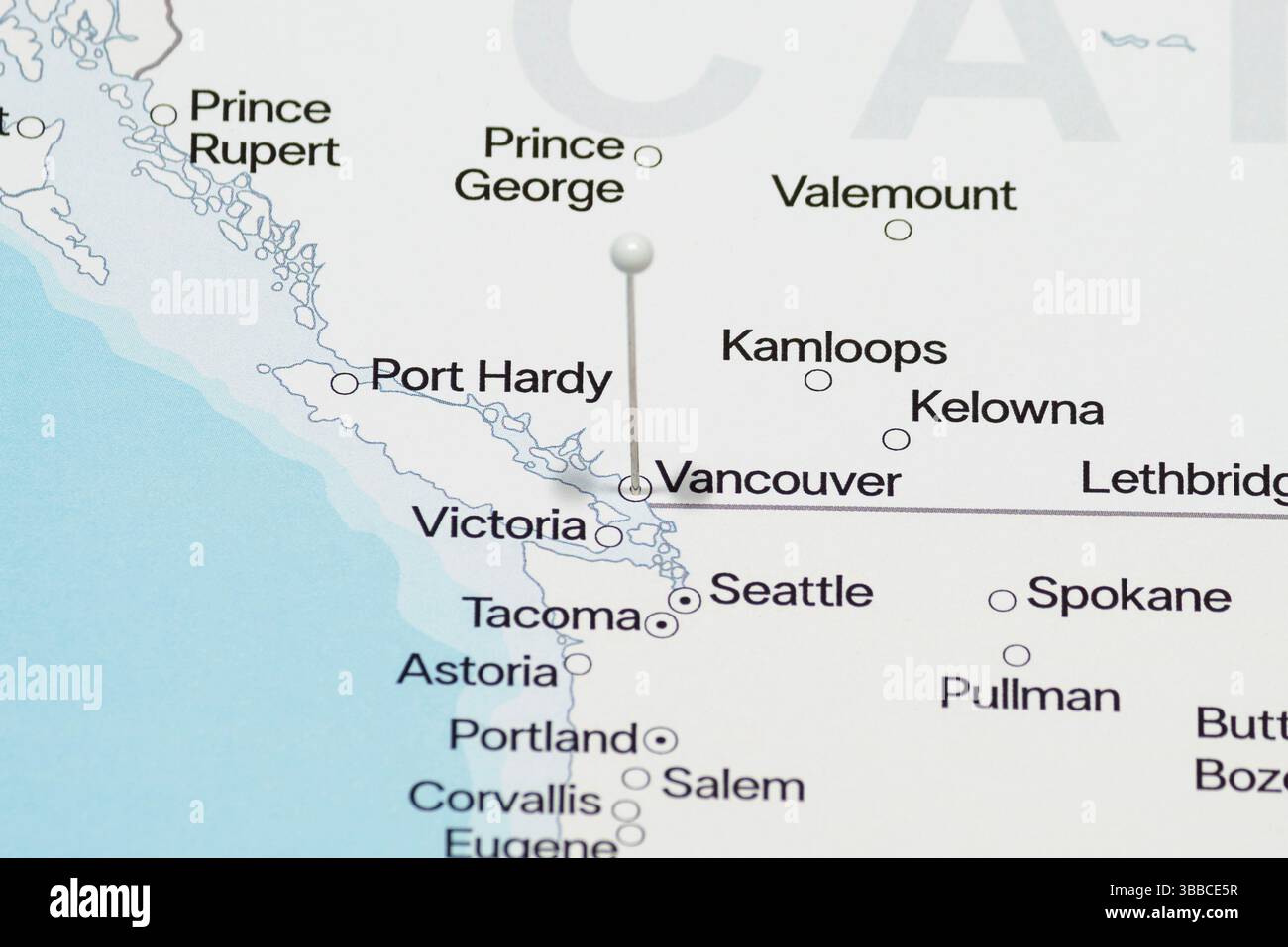 macro photo of a white pin needle into vancouver city of Canada ...