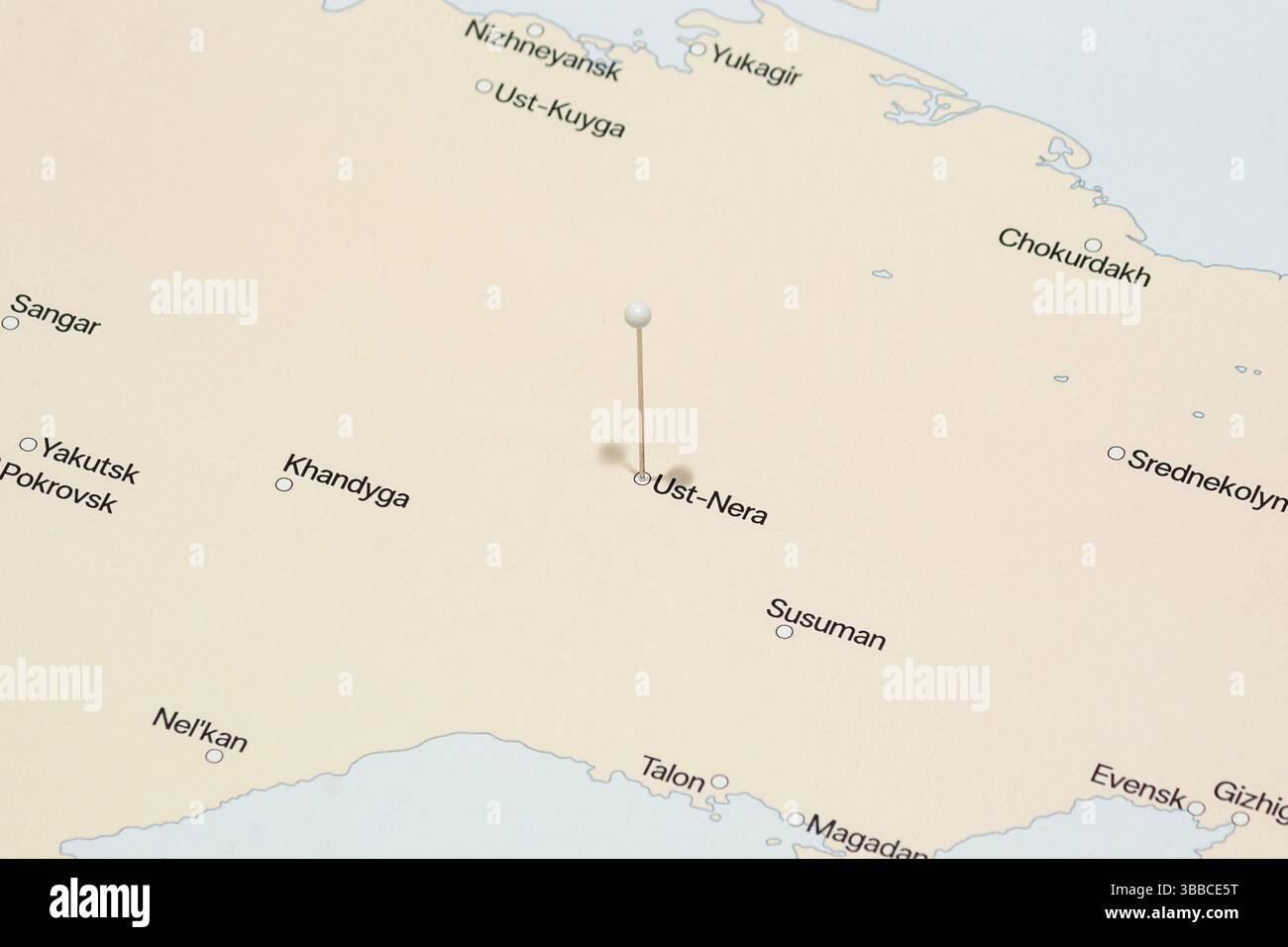 macro photo of a white pin needle into ust-nera city of Russia ...