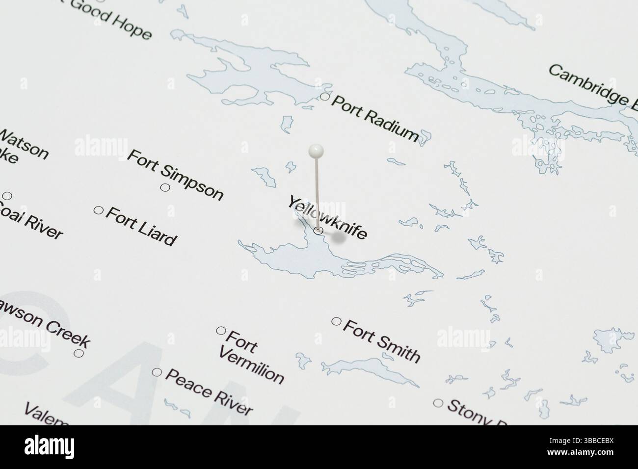 macro photo of a white pin needle into yellowknife city of Canada ...