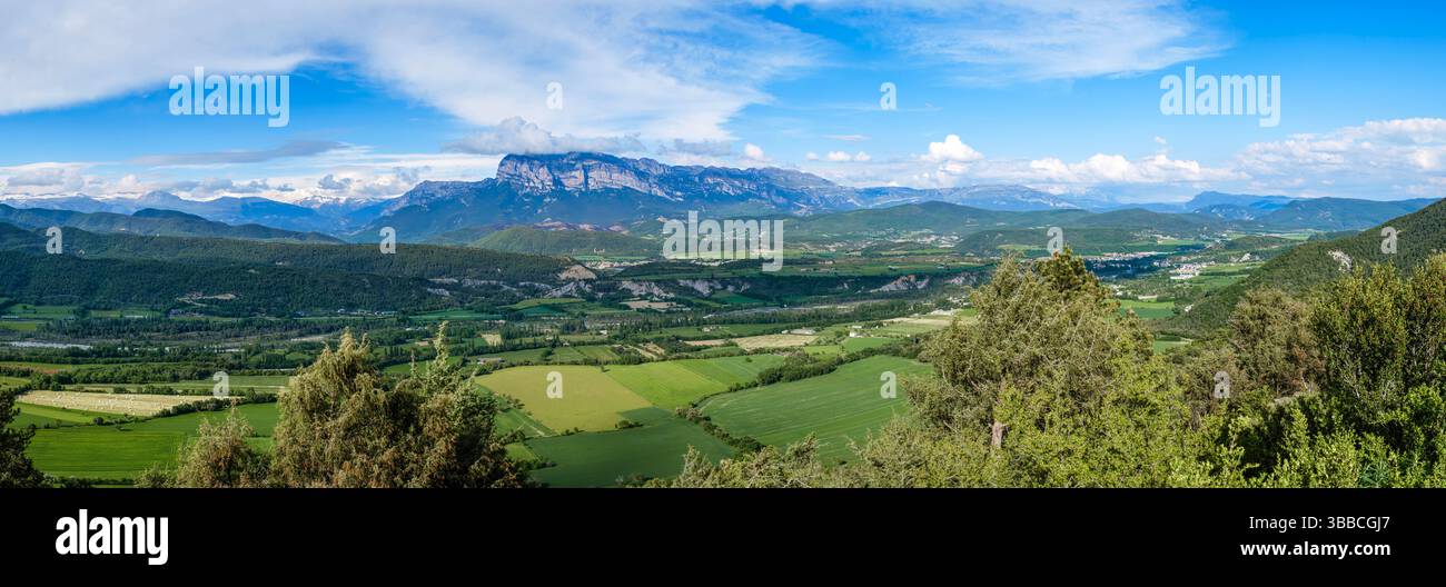 Breathtaking panoramic view of green agricultural valley with dramatic ...