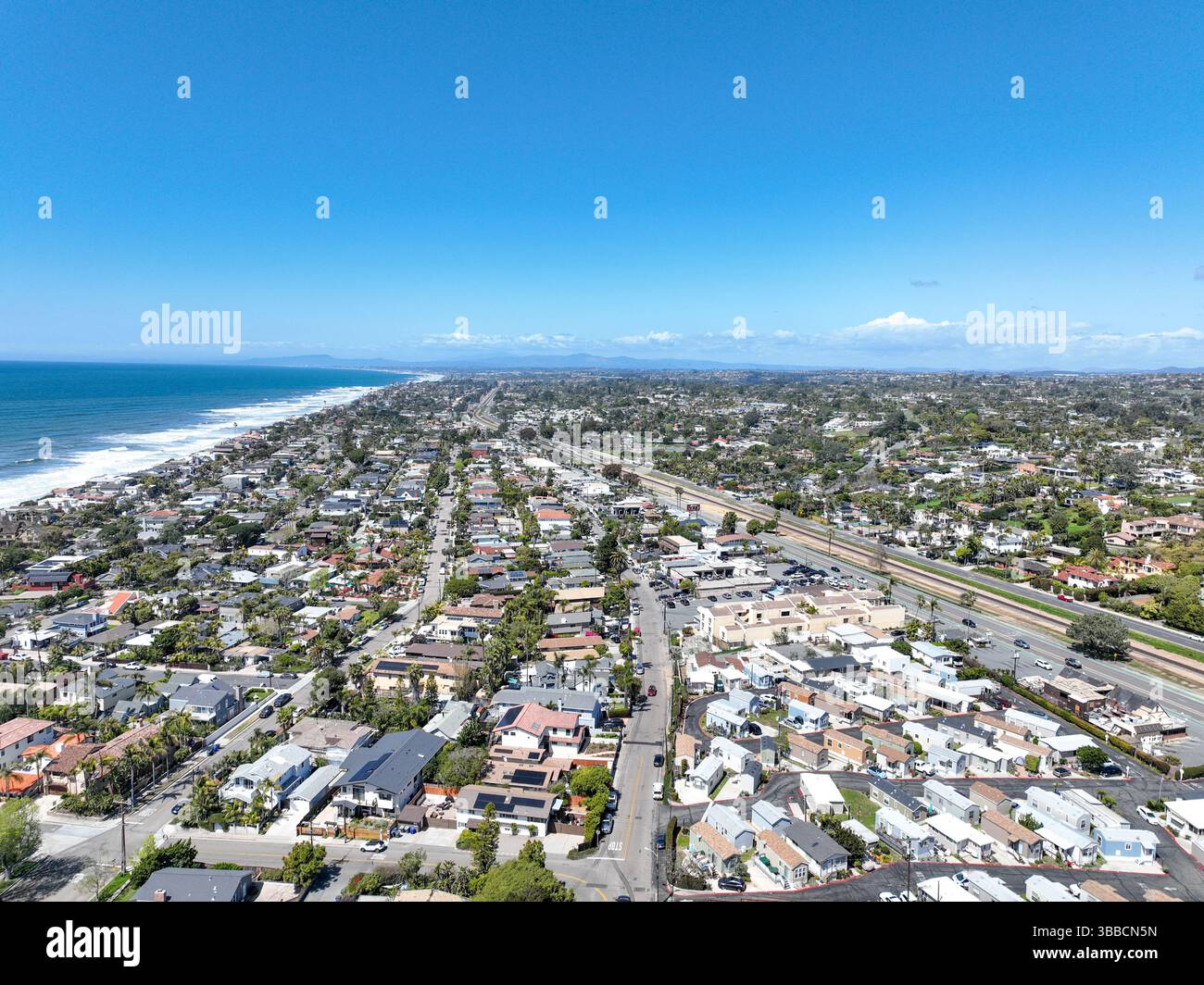 Aerial view of wealthy Encinitas town with blue ocean in San Diego ...