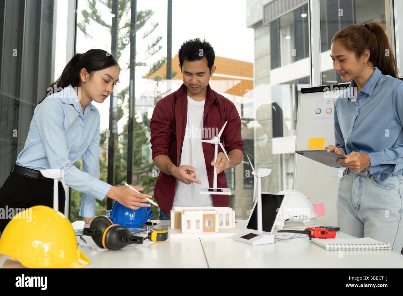 Innovative Engineering Team. Engineers collaborating on sustainable ...