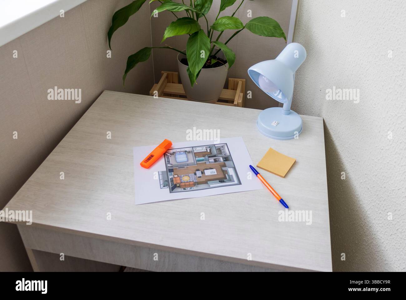 Layout of the small, furnished apartment printed on the sheet of paper ...