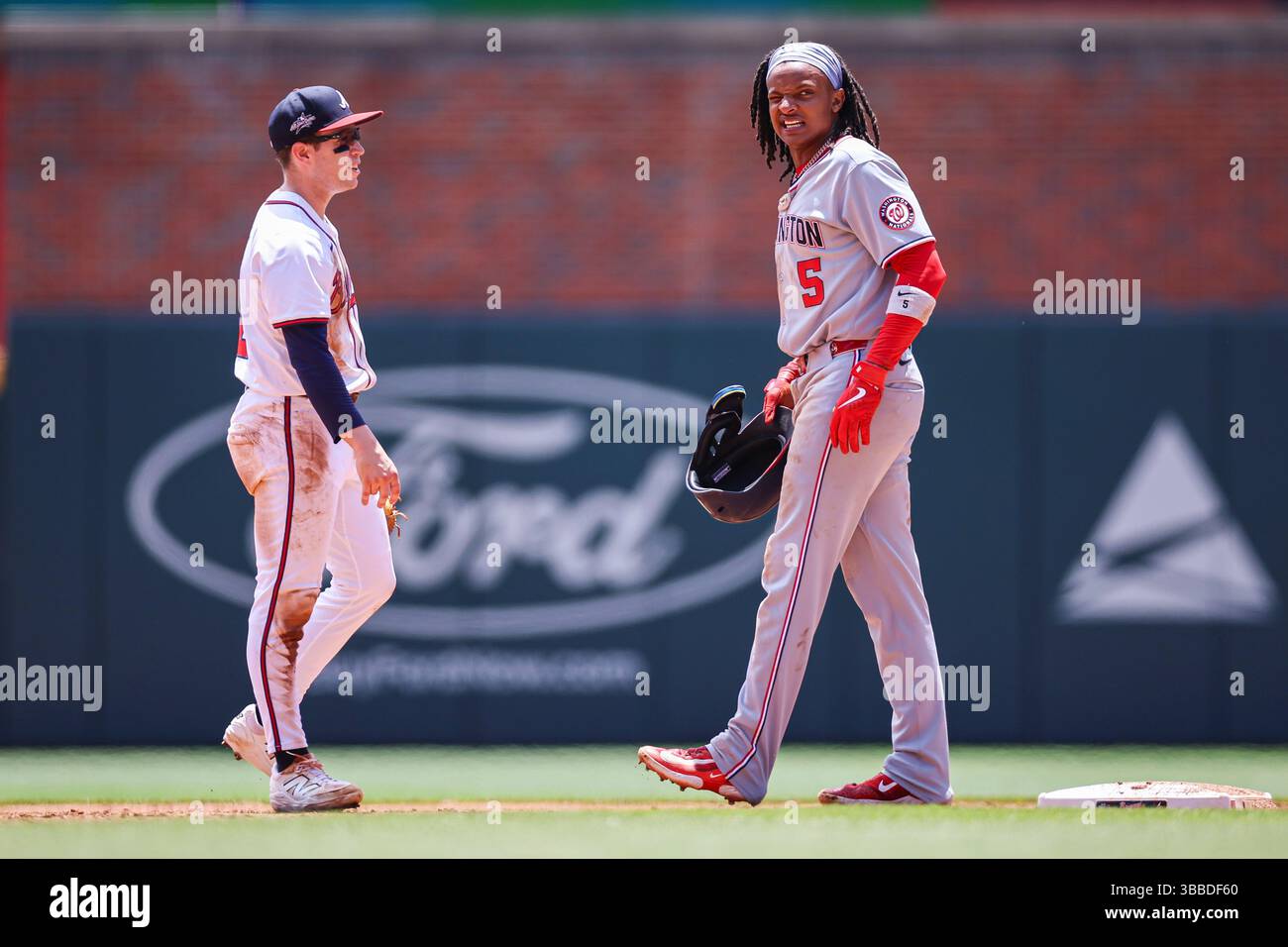 Atlanta Braves shortstop Nick Allen, left, reacts with Washington ...