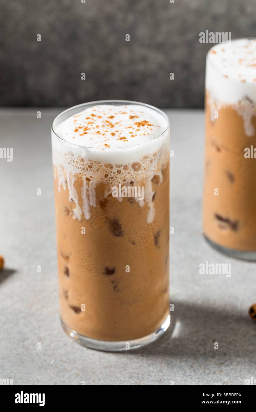 Cold Refreshing Iced Chai Tea Latte with Cream and Cinnamon Stock Photo ...