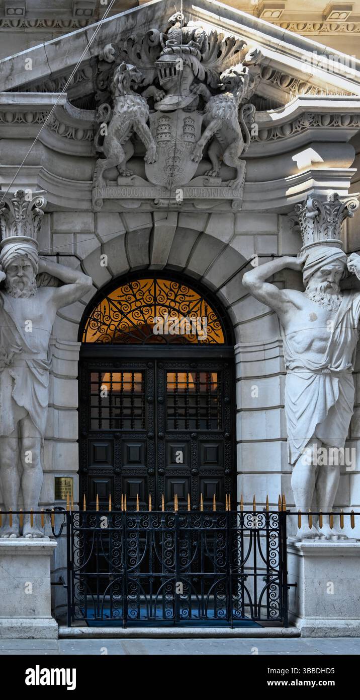 LONDON UK - APRIL 30, 2025: Entrance door with coat of Arms and motto ...