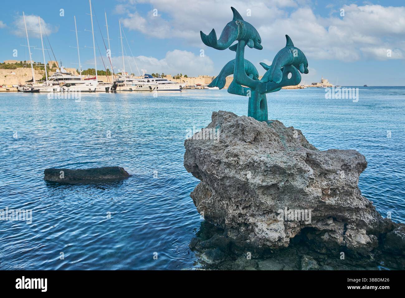 Crete.Greece may 15, 2025: The bronze dolphin sculpture by C. Neofitou ...