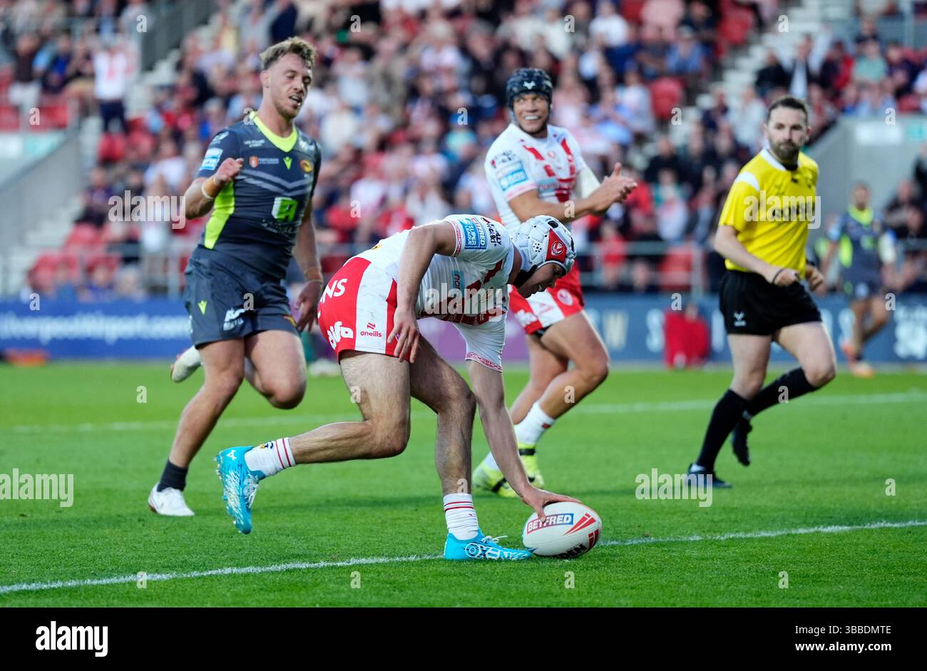 St Helens' George Whitby scores his sides fourth try during the Betfred ...