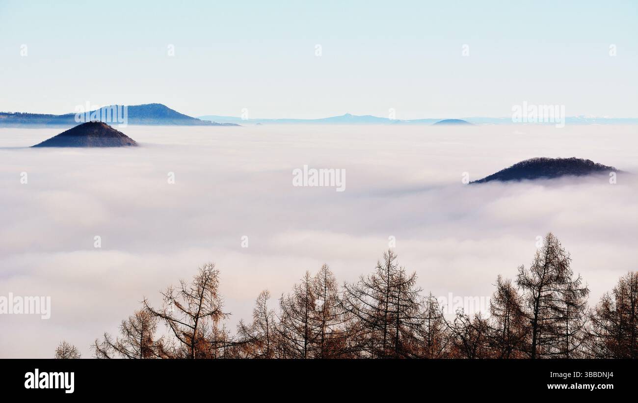 Mountain peaks rising above sea hi-res stock photography and images - Alamy