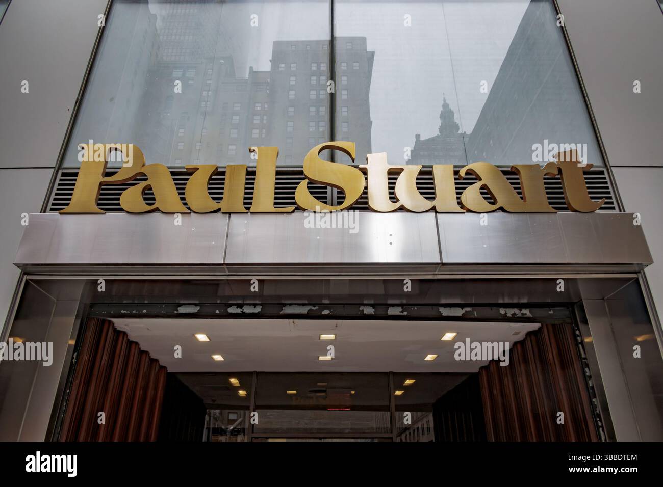 USA. 15th May, 2025. Sign at the entrance to the Paul Stuart store in ...