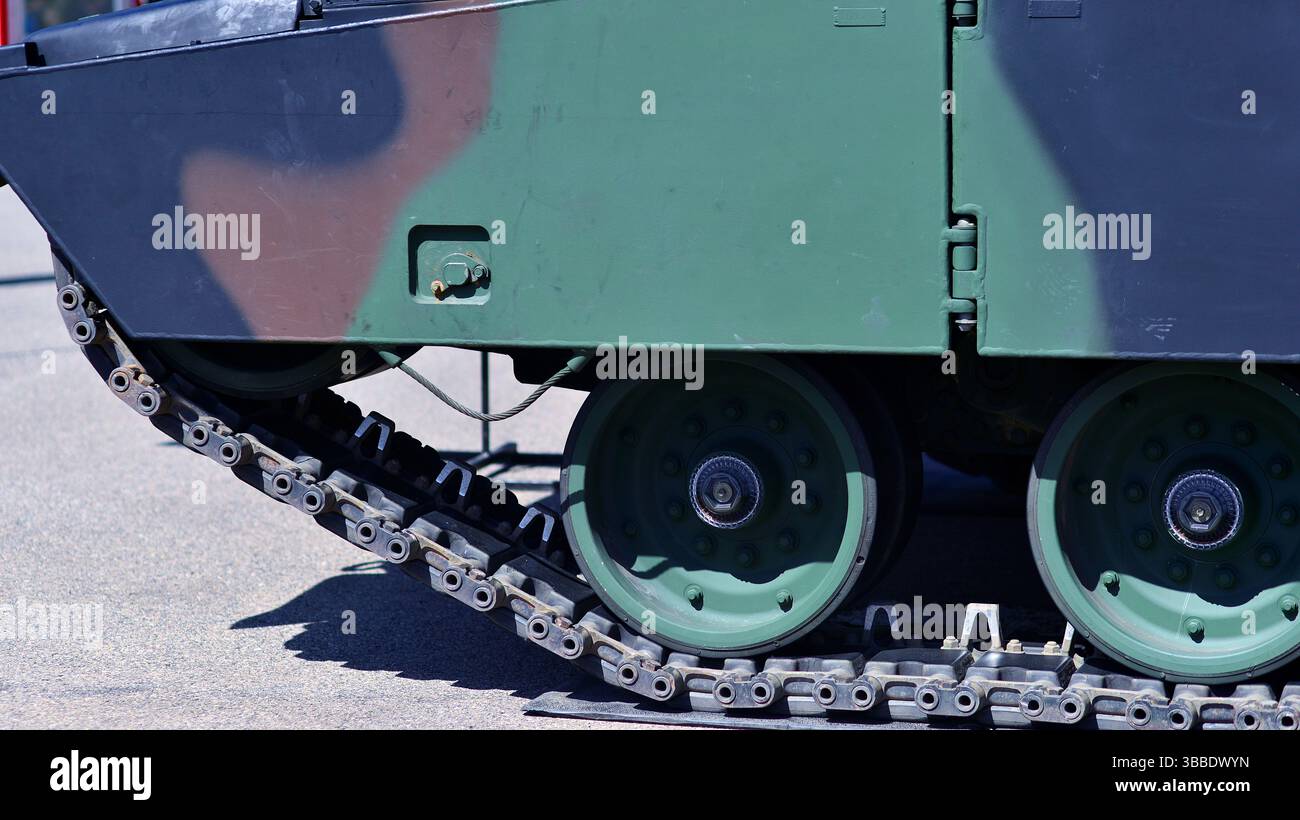 Caterpillar of a modern tank. Undercarriage with tracks and slides of ...