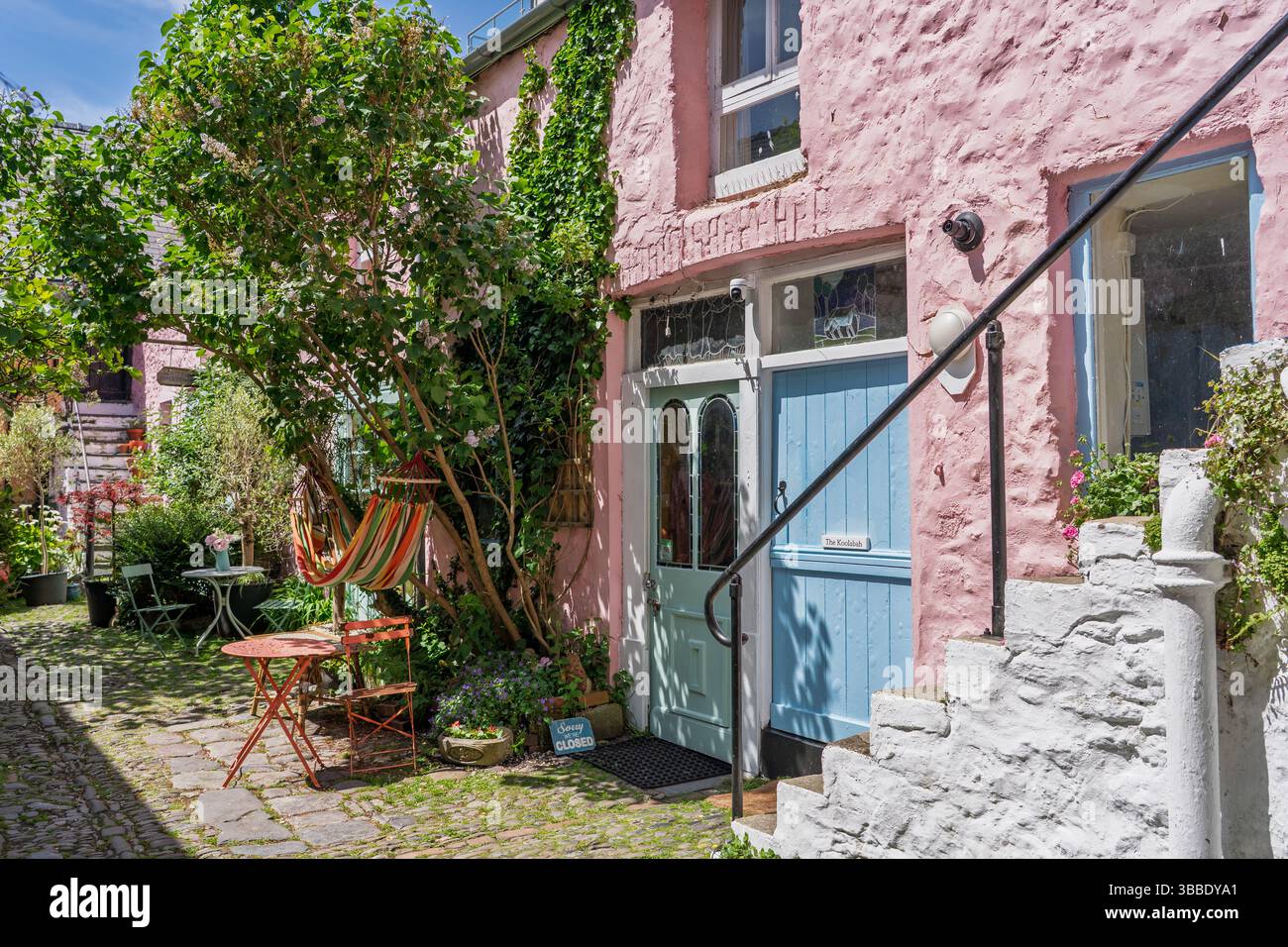 Colourful Brychan Yard off a side street in Tenby, South Wales Stock ...