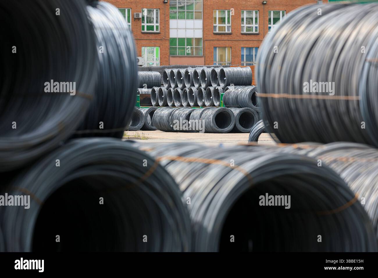Riesa, Germany. 15th May, 2025. Wire coils are stored at Elbe ...